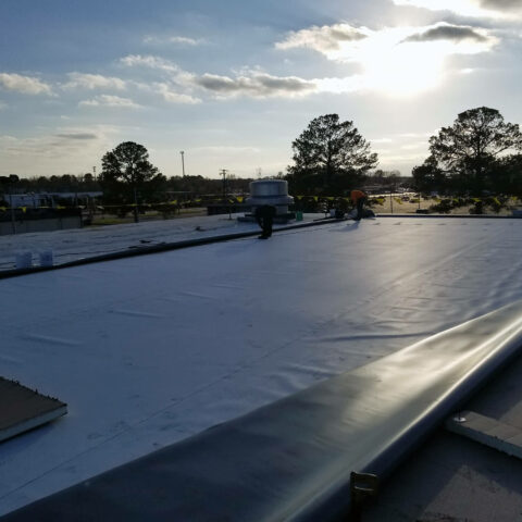 white TPO membrane roof system – Andrews Roofing